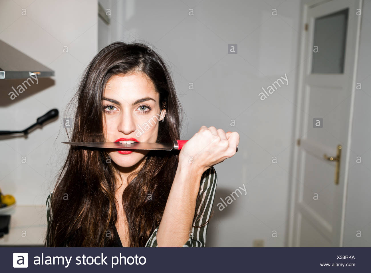 Knife Between Teeth High Resolution Stock Photography and Images - Alamy