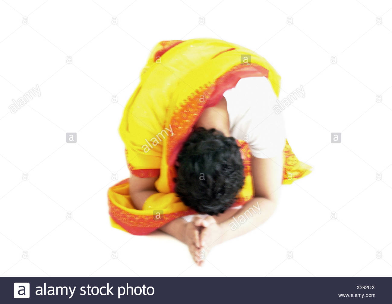 Man Kneeling And Praying Cut Out Stock Images & Pictures - Alamy