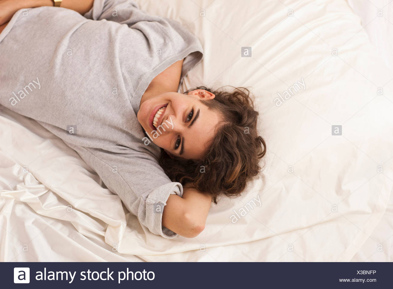Lying On Back Bedroom One Young Woman Only One Person Stock Photos ...