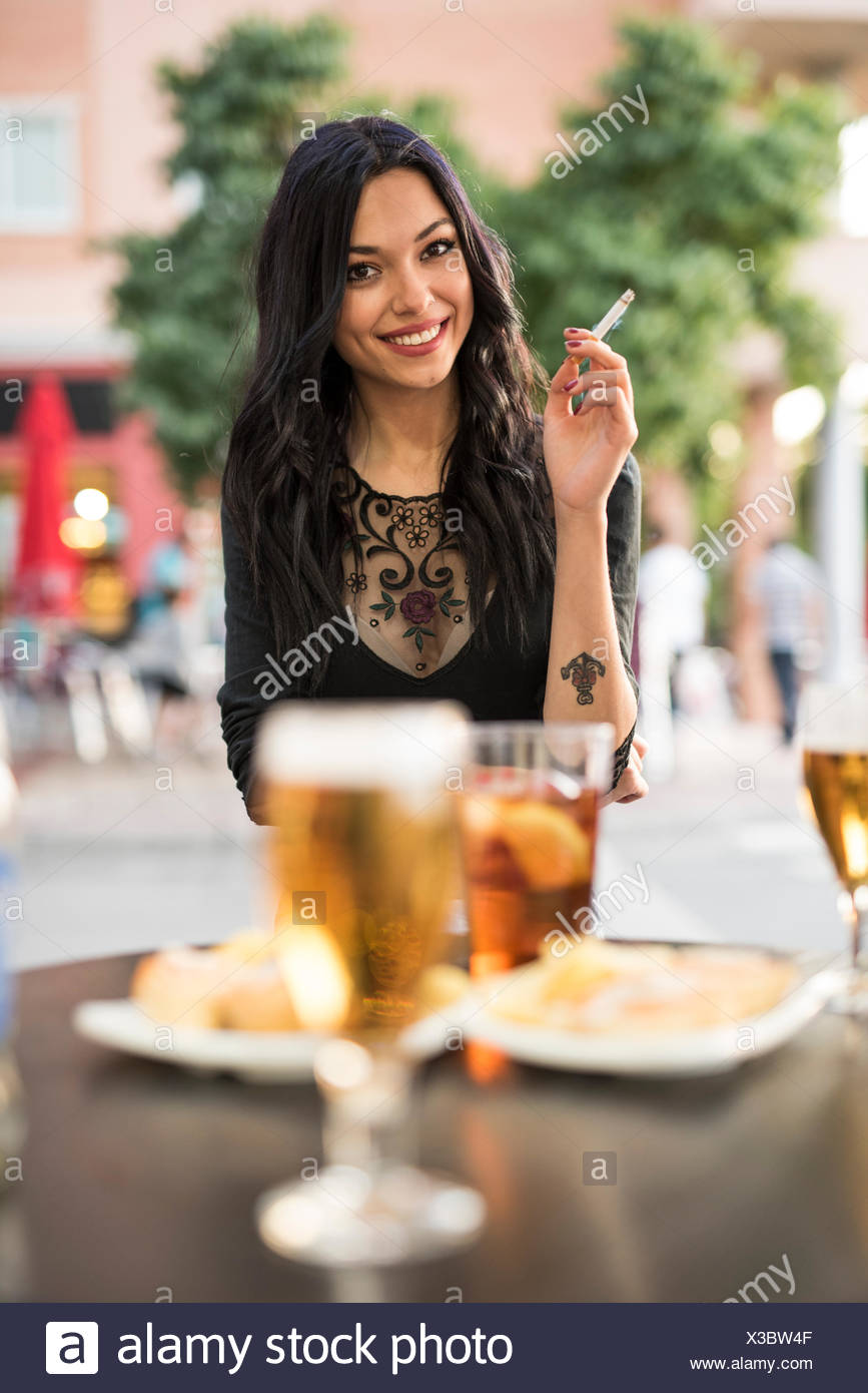 Smoking Cigarette Bar Stock Photos & Smoking Cigarette Bar Stock Images ...