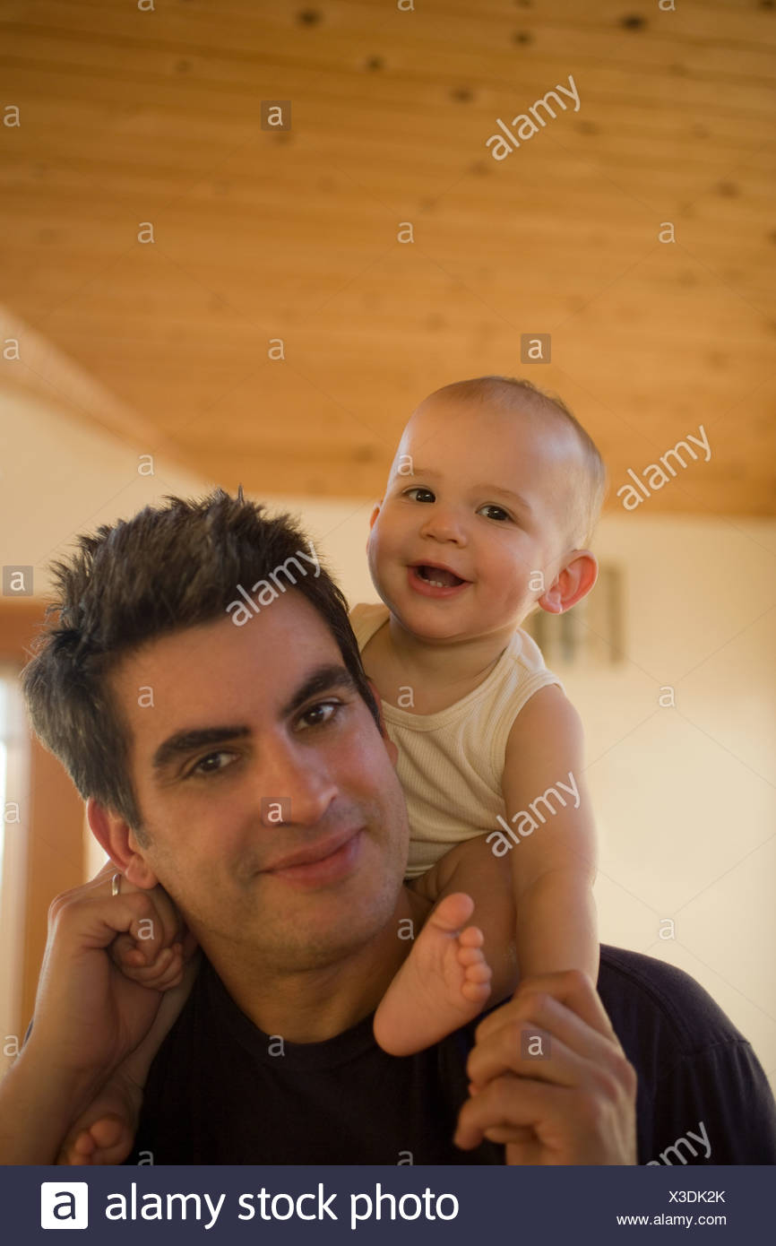 Father Holding Baby On Shoulders High Resolution Stock Photography and ...