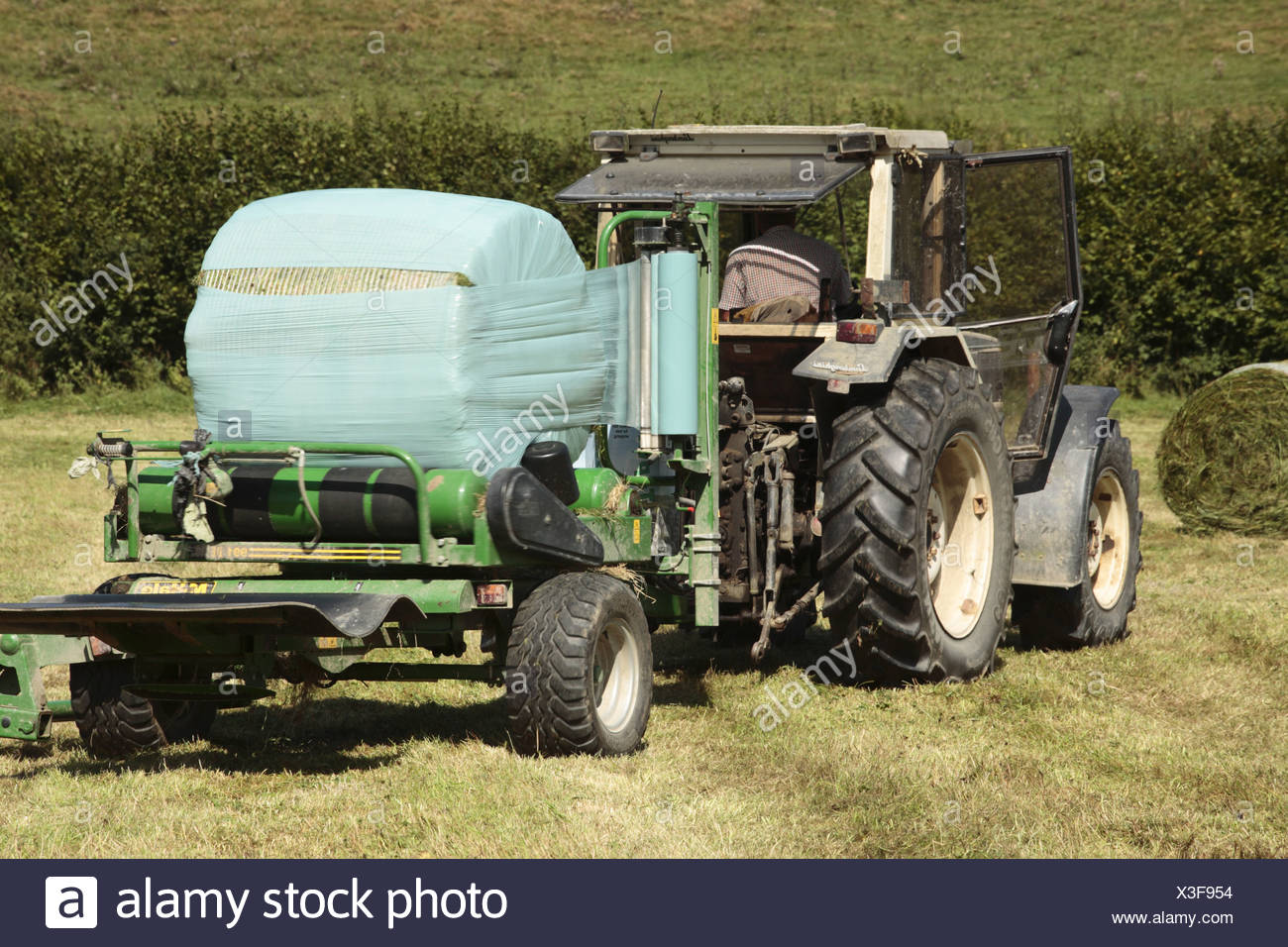 Grass Silage Wrapping Machine High Resolution Stock Photography and ...