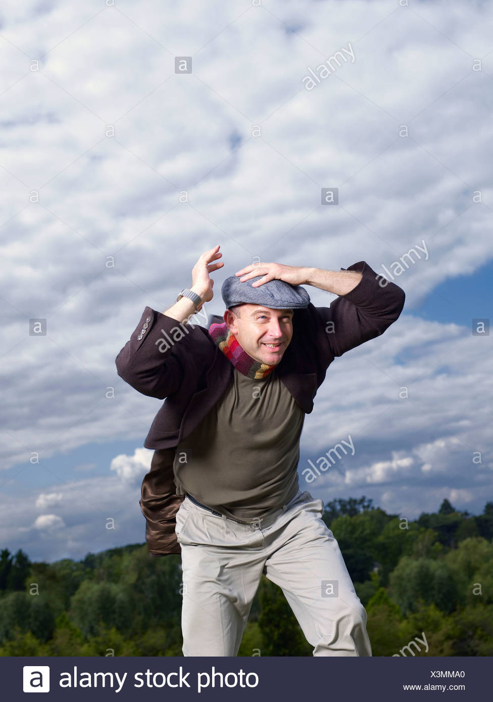 Wind Blowing Hat High Resolution Stock Photography and Images - Alamy