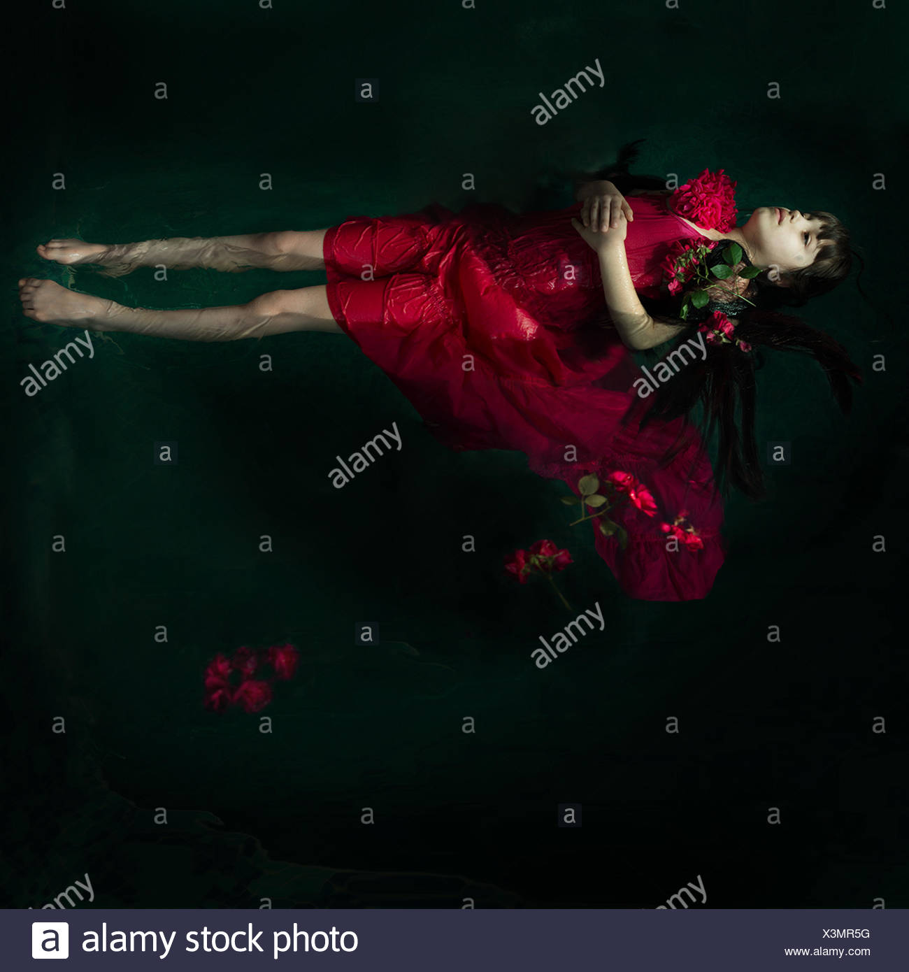 Girl In Red Dress High Resolution Stock Photography and Images - Alamy