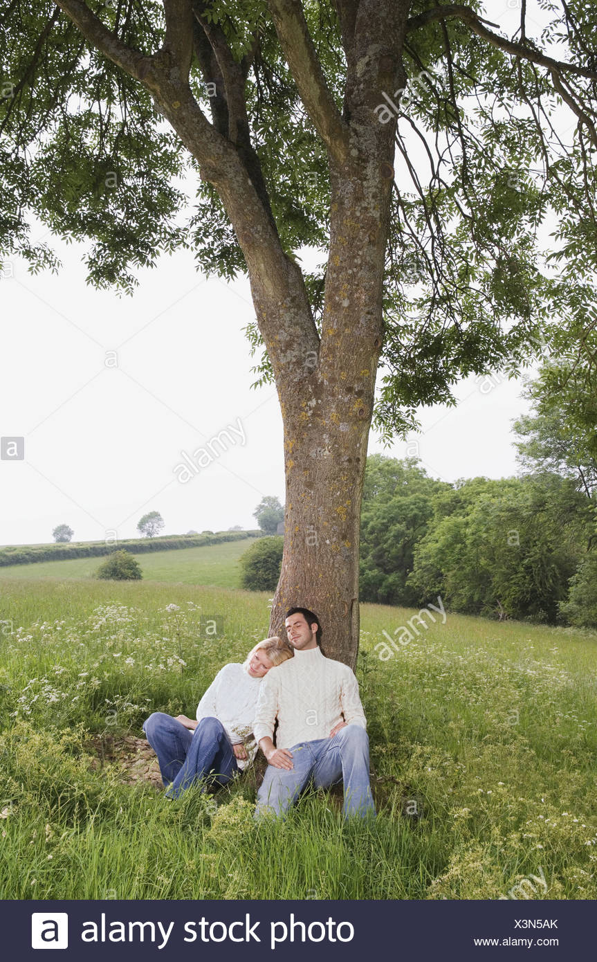 Leaning Against A Tree High Resolution Stock Photography and Images - Alamy