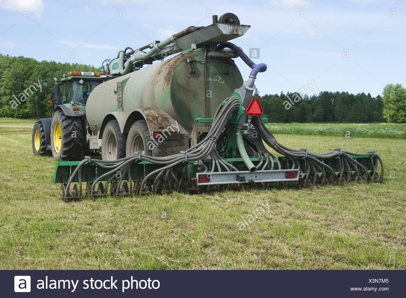 John Deere Tractor With Slurry Tanker High Resolution Stock Photography ...