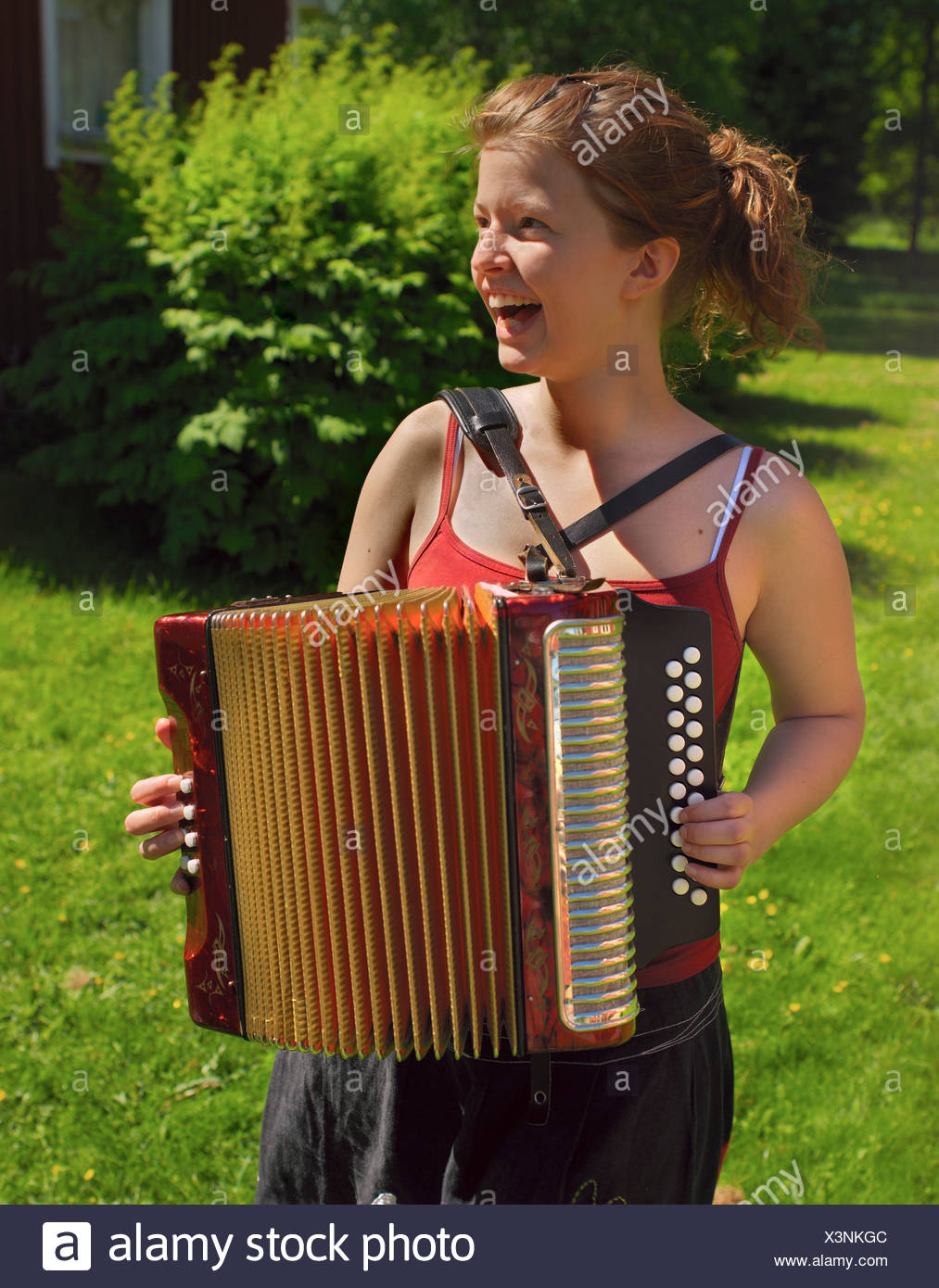 Young Woman Playing Accordion Stock Photos & Young Woman Playing ...