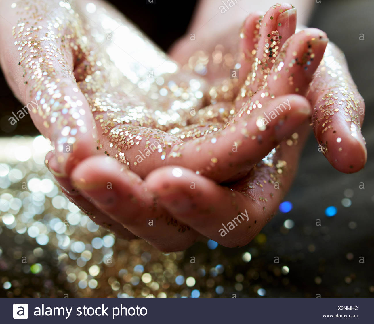 Gold Glitter Hand High Resolution Stock Photography and Images - Alamy