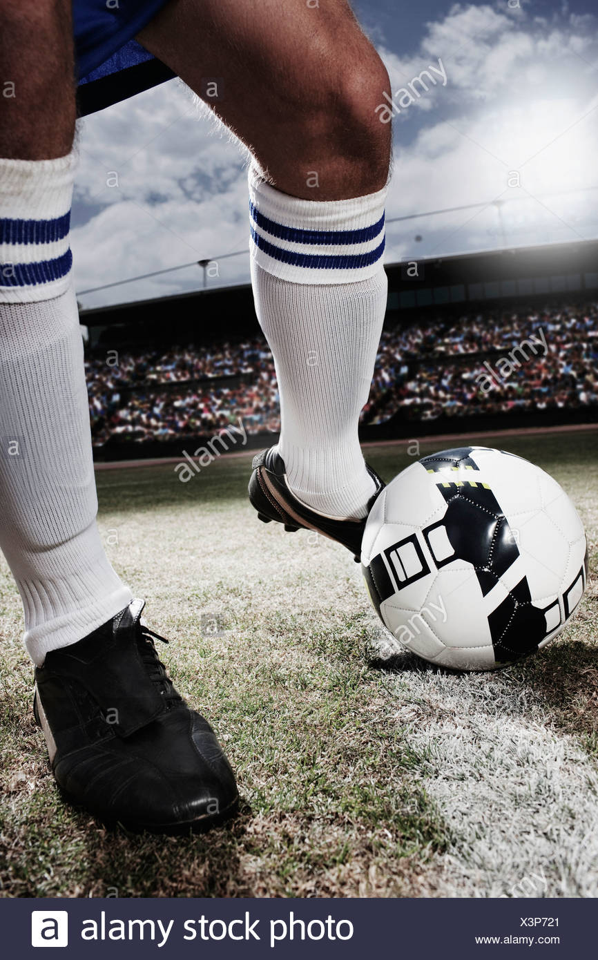 Footballer Kicking Ball Stock Photos & Footballer Kicking Ball Stock ...