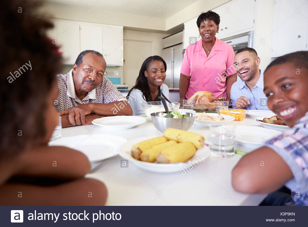 African Family Eating Around Table High Resolution Stock Photography ...