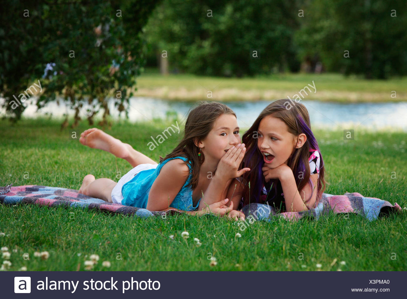 Children Telling Secrets Stock Photos & Children Telling Secrets Stock ...
