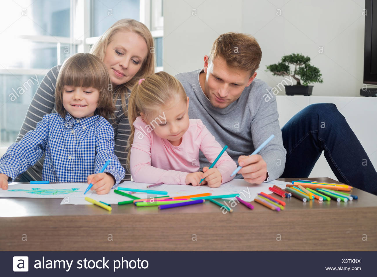 Parents And Children Drawing High Resolution Stock Photography and ...