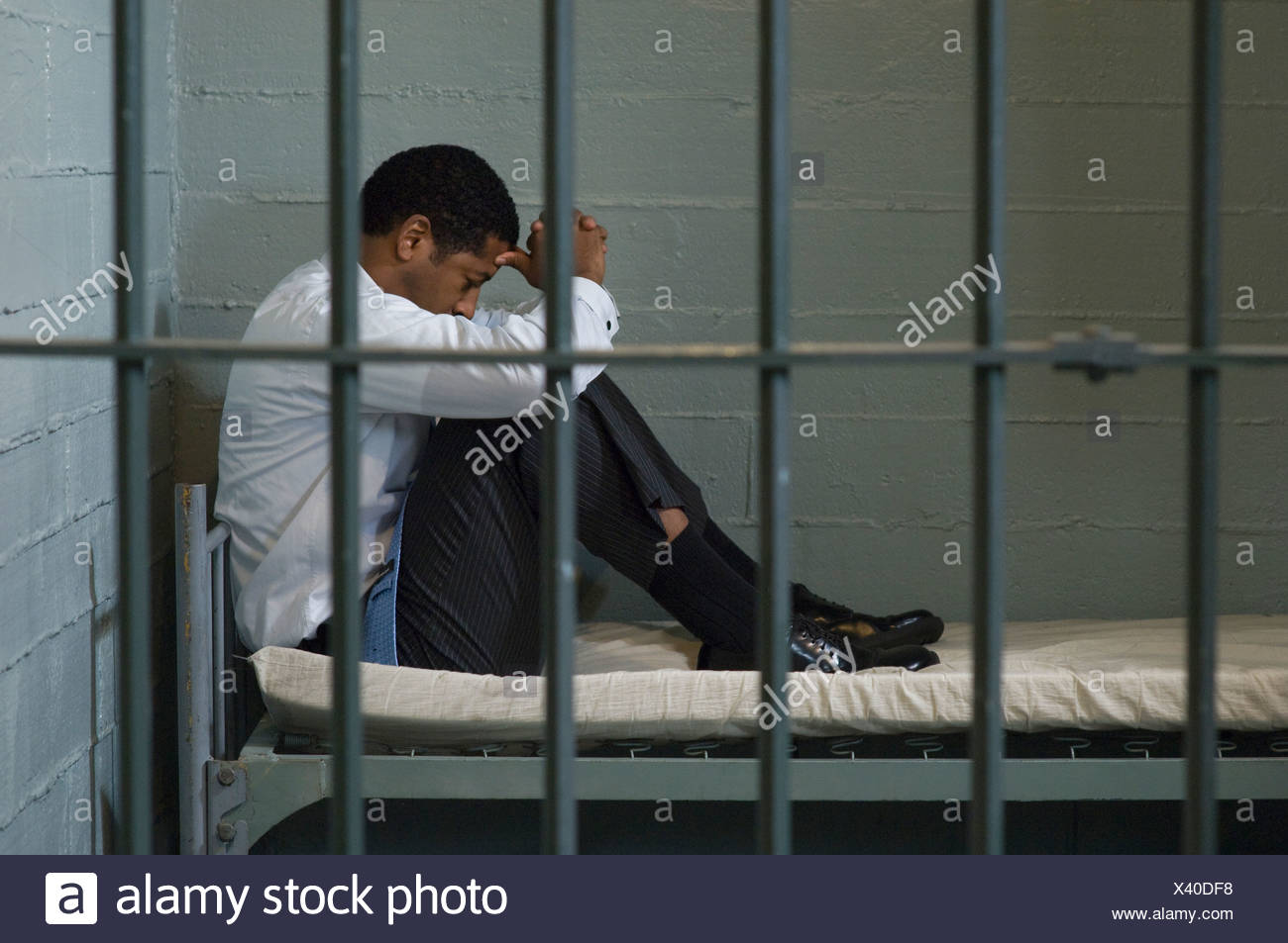 Sitting In Prison Cell High Resolution Stock Photography and Images - Alamy