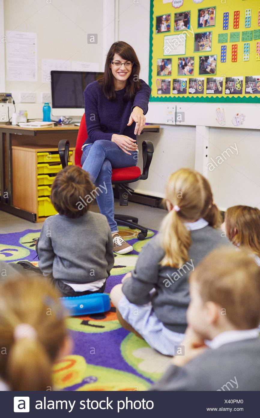 Children Sitting On Floor Classroom High Resolution Stock Photography ...