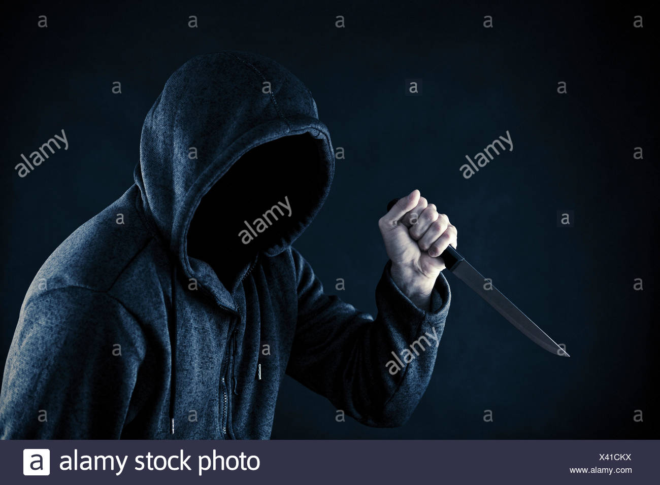 Black Man Holding Knife Threat Stock Photos & Black Man Holding Knife ...