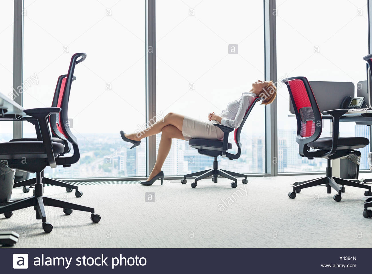 Leaning Back Chair Stock Photos & Leaning Back Chair Stock Images - Alamy