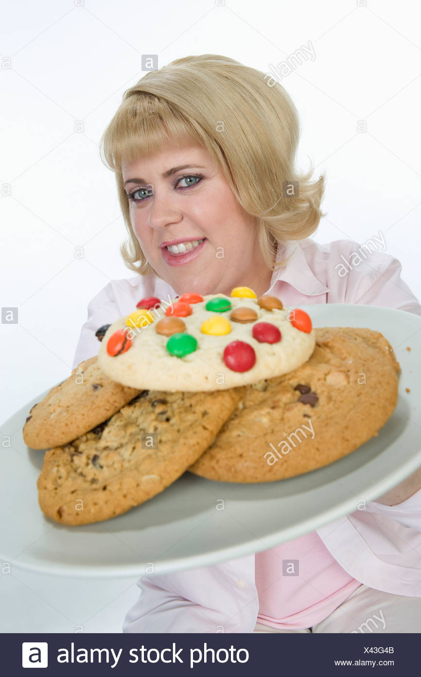 Blonde Woman Eating Cookie Stock Photos & Blonde Woman Eating Cookie ...