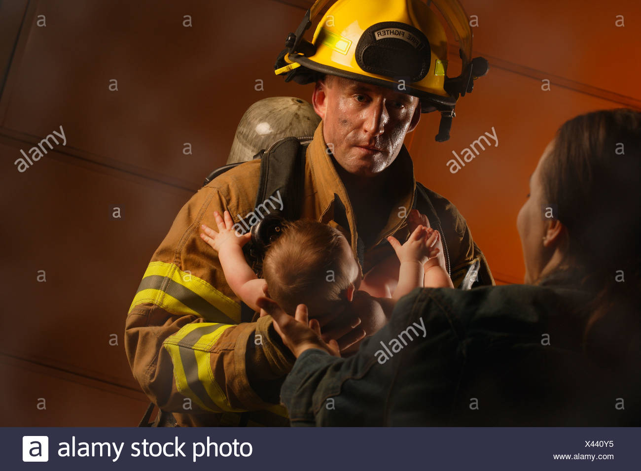 Fireman Rescuing Child High Resolution Stock Photography and Images - Alamy
