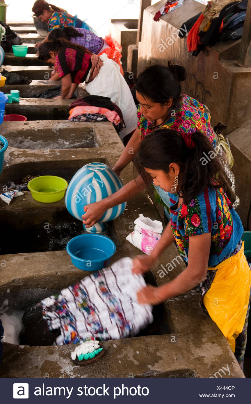 Indian Women Washing Clothes High Resolution Stock Photography and ...