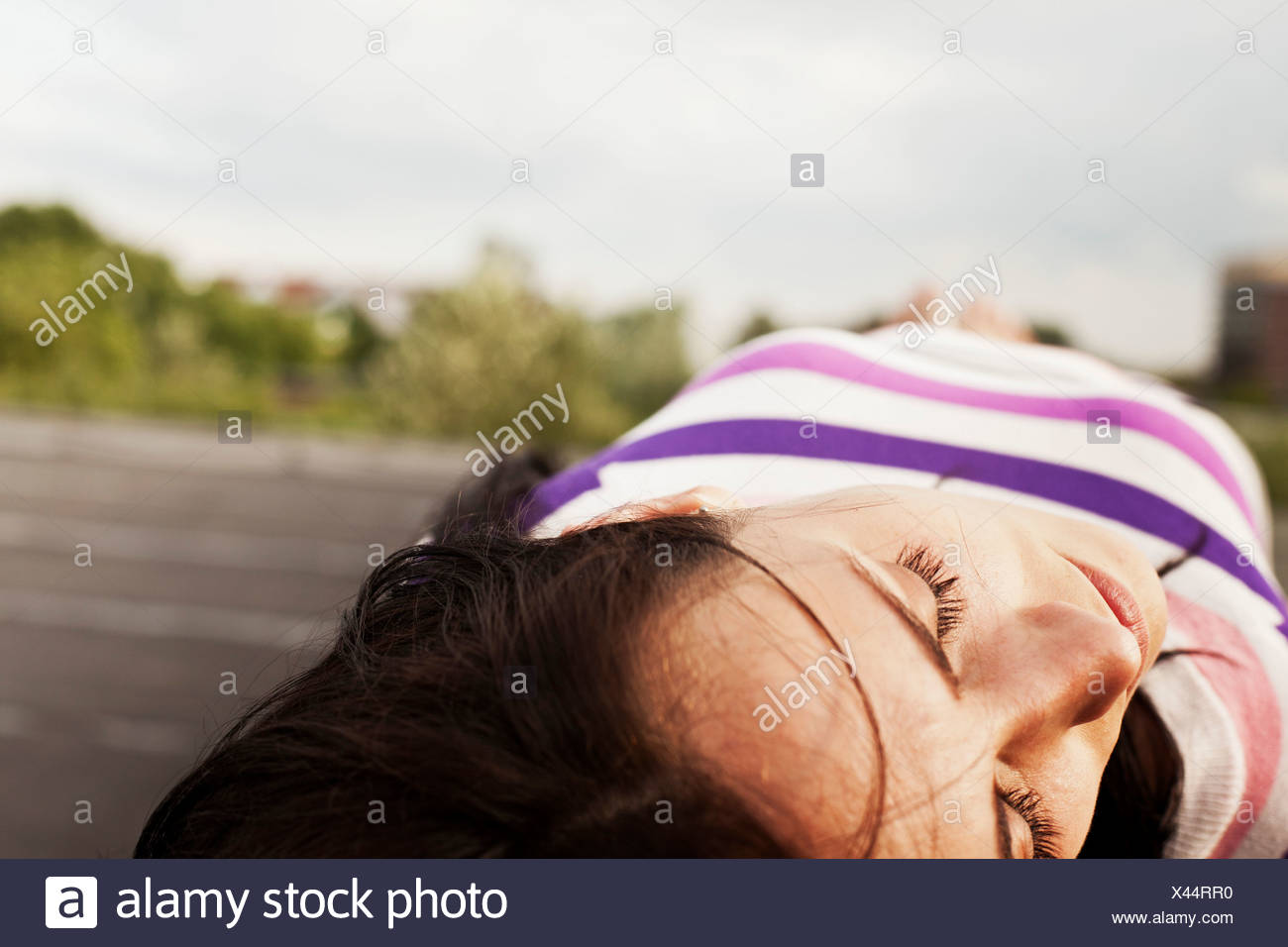 Young Woman Lying On Roof High Resolution Stock Photography and Images ...