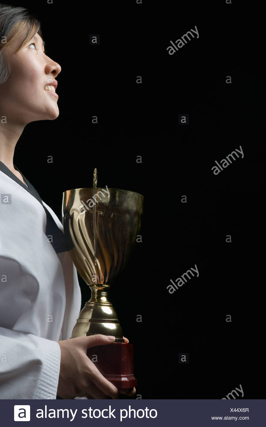 Black Holding Trophy High Resolution Stock Photography and Images - Alamy