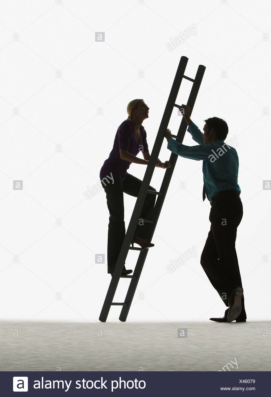 A Woman Climbs A Ladder Stock Photos & A Woman Climbs A Ladder Stock ...