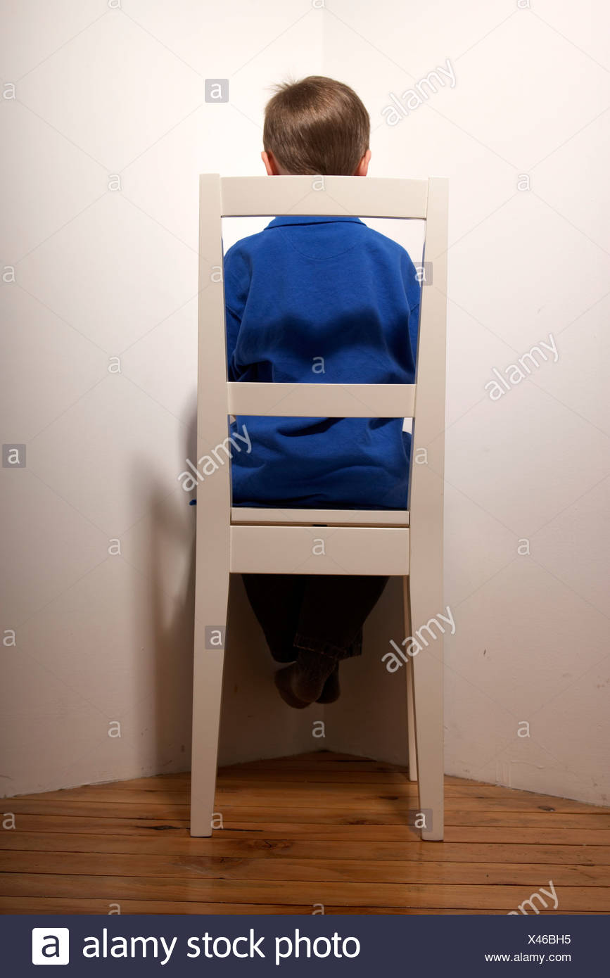 Sitting In Corner As Punishment High Resolution Stock Photography and ...