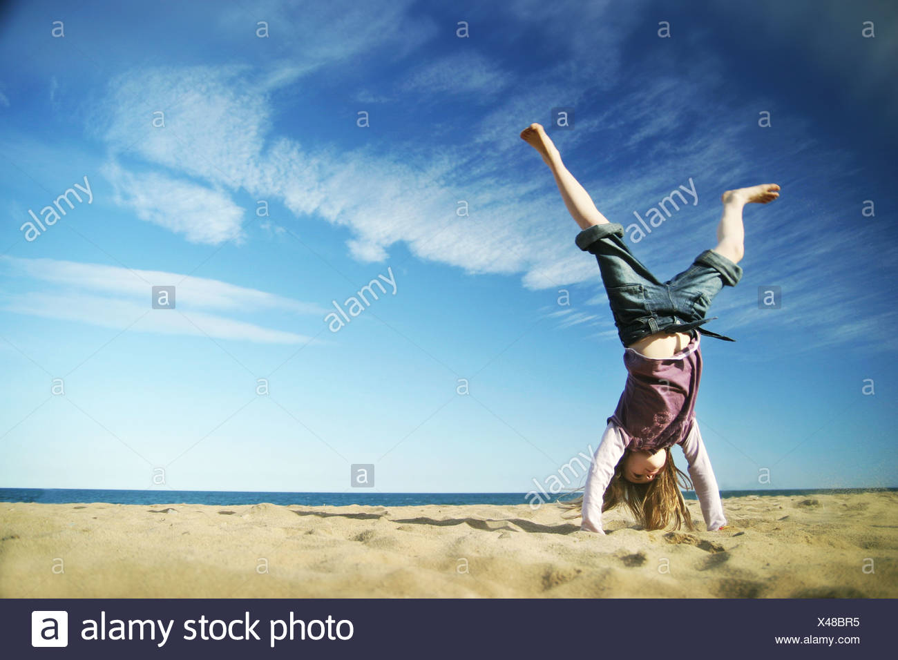 Girl Doing Handstand High Resolution Stock Photography and Images - Alamy