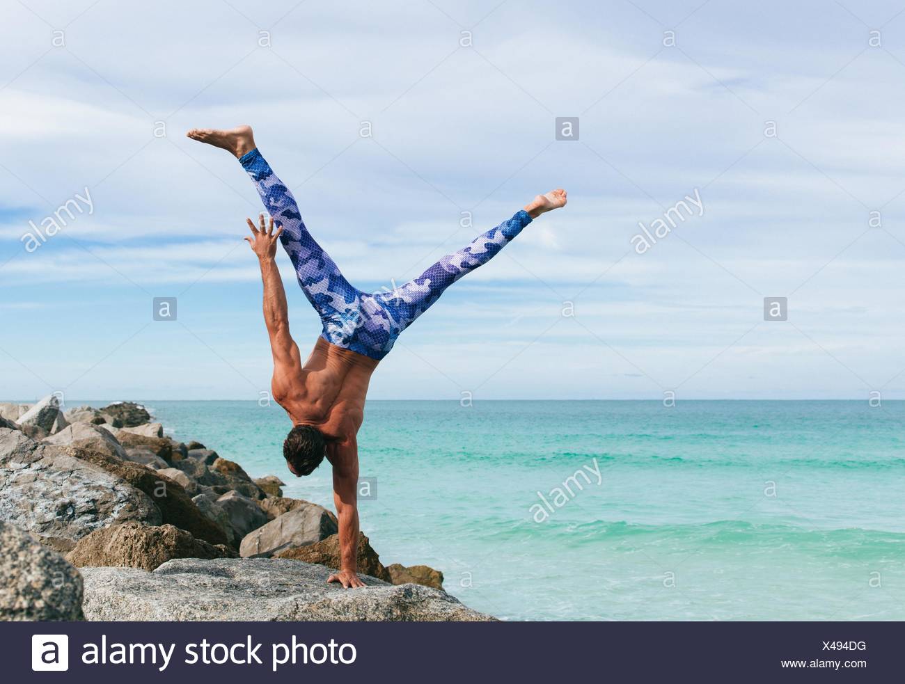 Man Upside Down Rock High Resolution Stock Photography and Images - Alamy