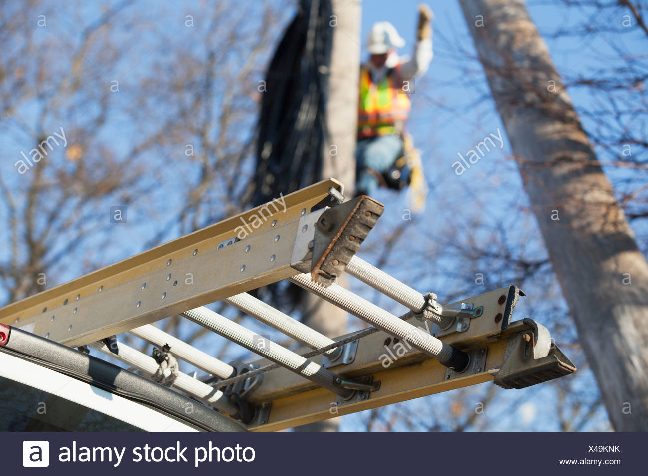 Cable Lineman Standing On Ladder High Resolution Stock Photography and ...