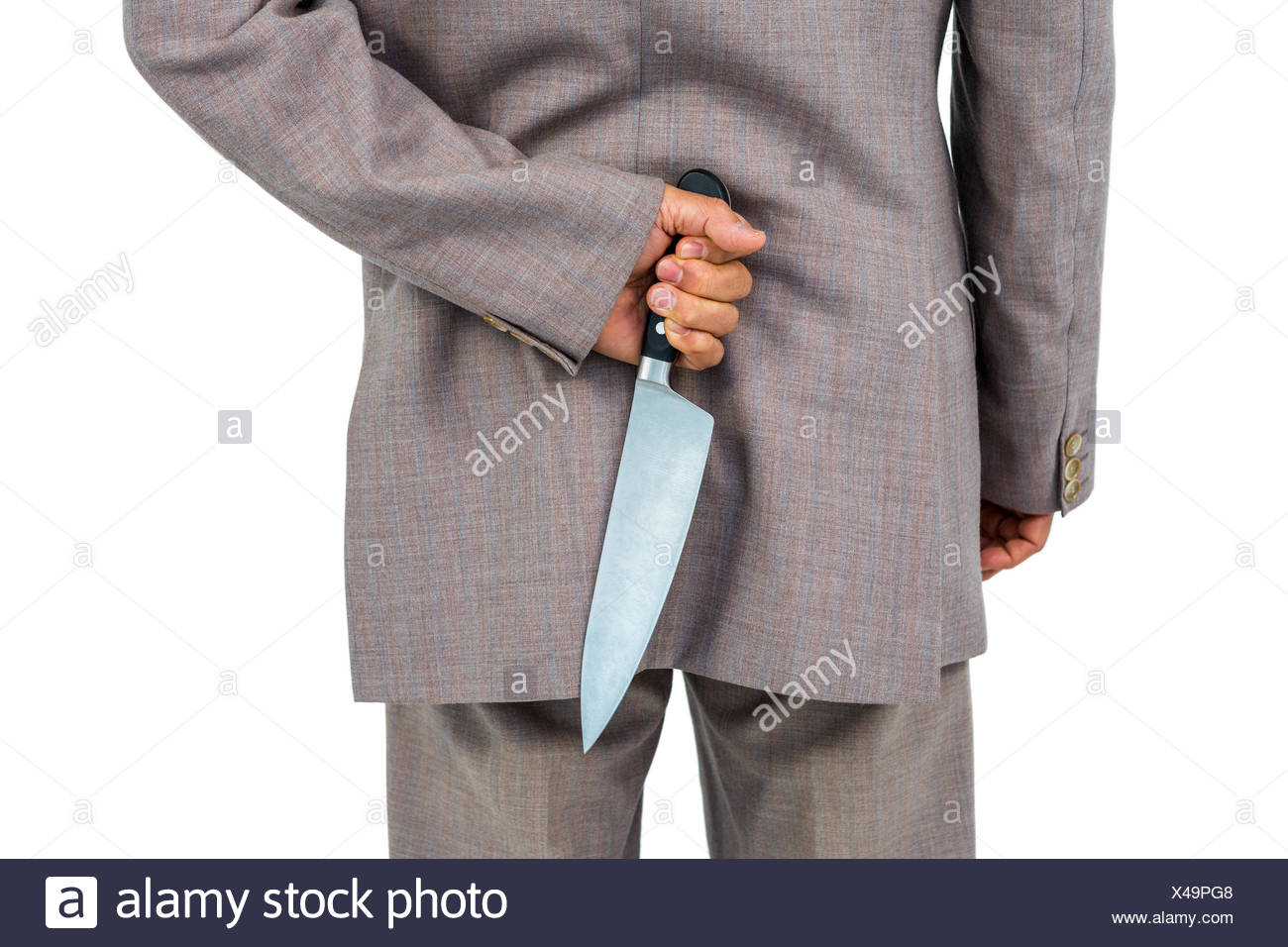 Knife Behind Back Stock Photos & Knife Behind Back Stock Images - Alamy