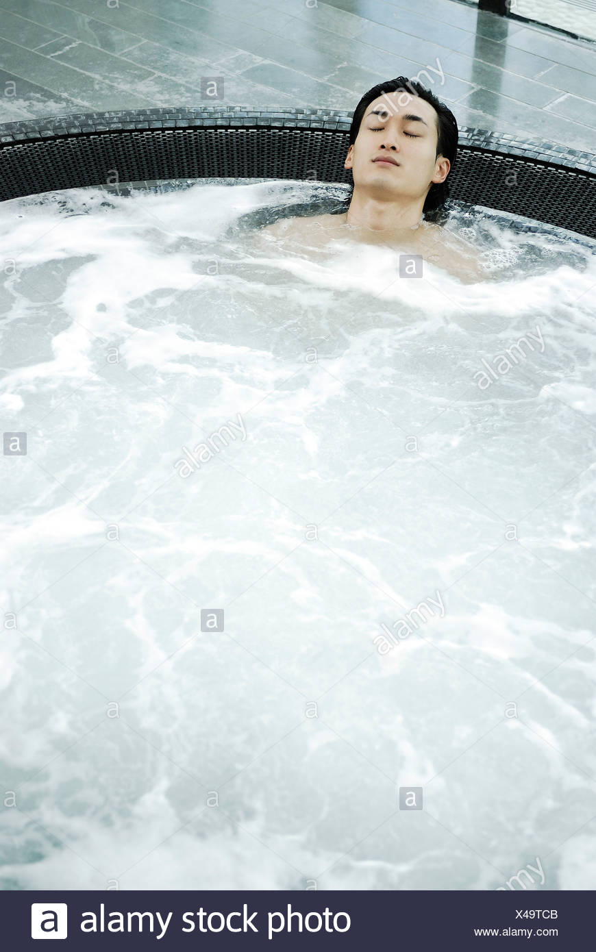 Young Man In Hot Tub Stock Photos & Young Man In Hot Tub Stock Images ...