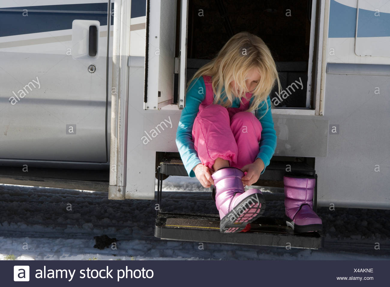 Putting On Boots High Resolution Stock Photography and Images - Alamy