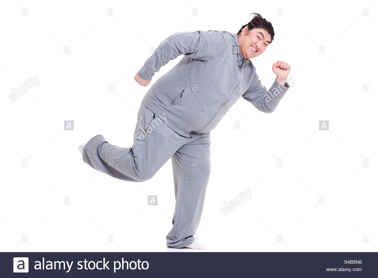 Overweight Young Asian Man Running Stock Photos & Overweight Young ...