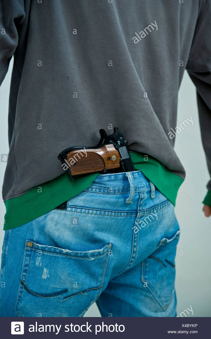 Hiding Pistol Stock Photos & Hiding Pistol Stock Images - Alamy