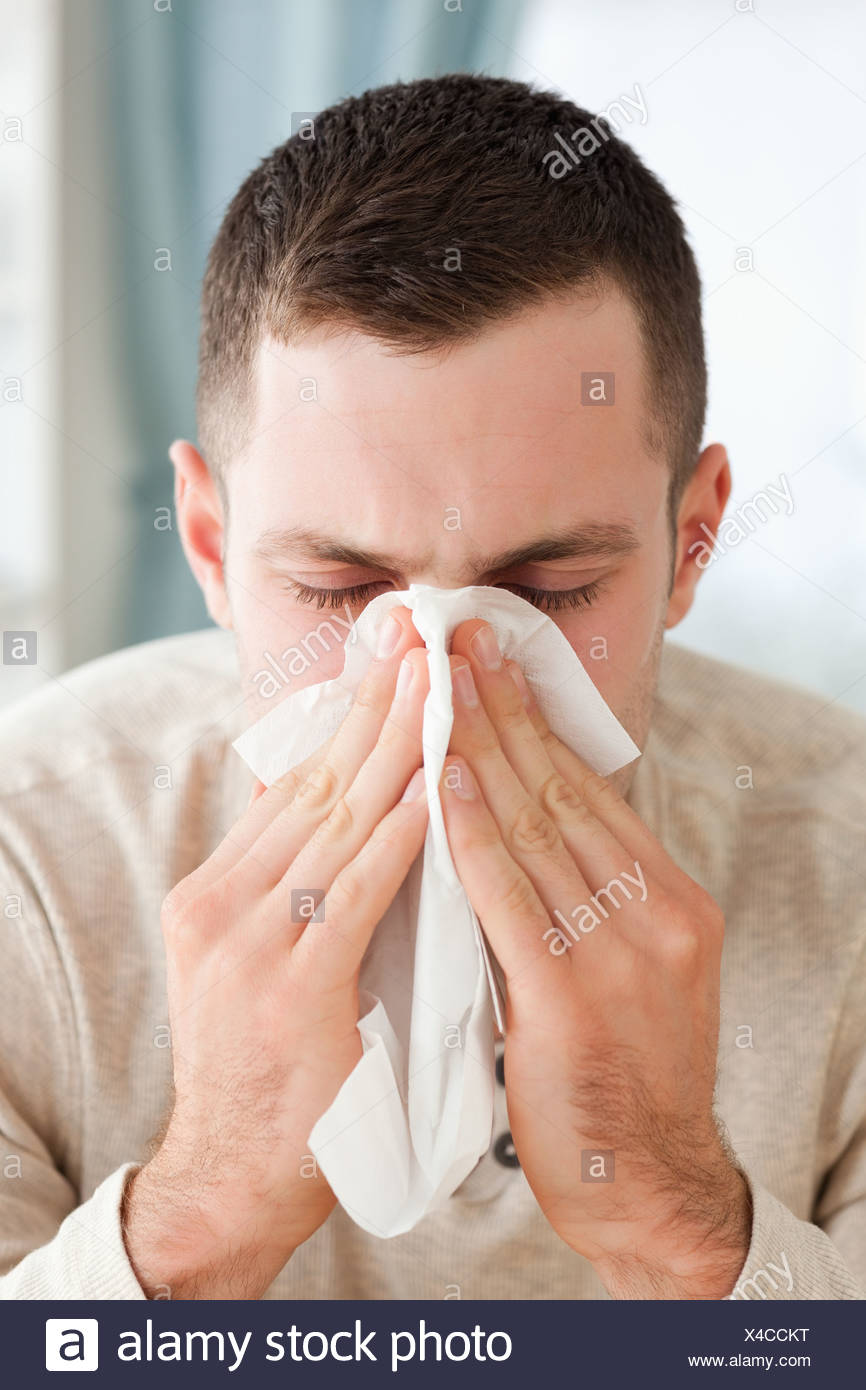 Young Man Holding His Nose High Resolution Stock Photography and Images ...