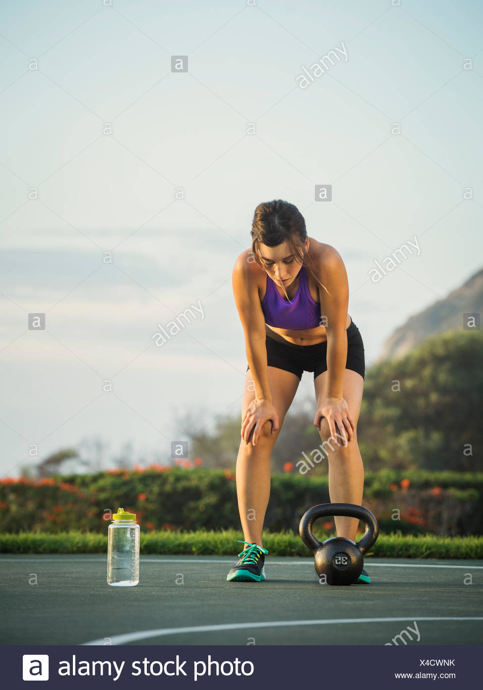 Young Woman Bending Over Resting High Resolution Stock Photography and ...