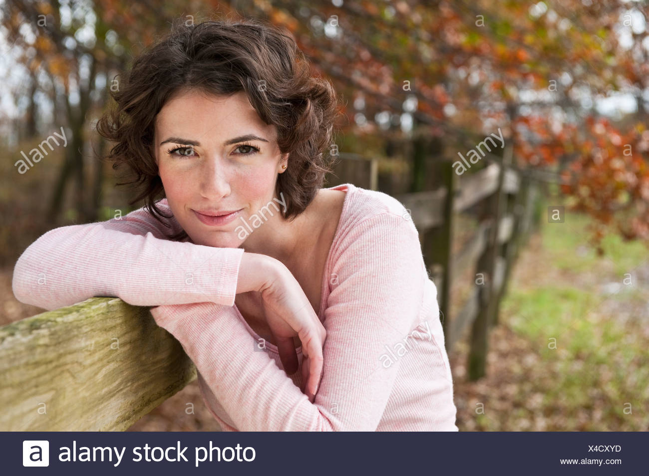Leaning On Fence Stock Photos & Leaning On Fence Stock Images - Alamy