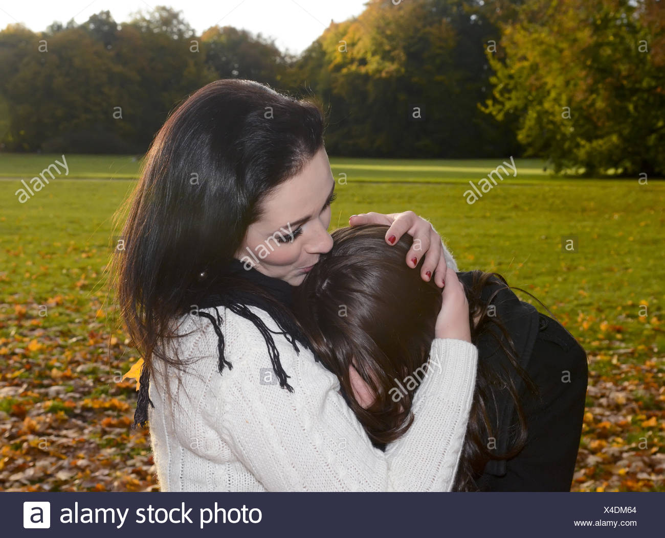 Two Women Hugging Sad Stock Photos & Two Women Hugging Sad Stock Images ...