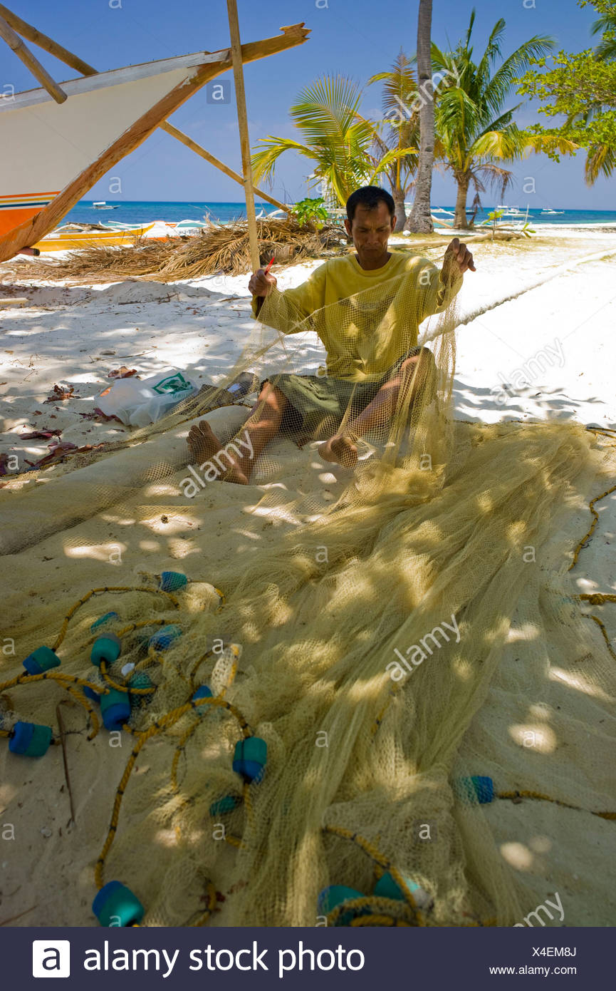 Fish Net Repair High Resolution Stock Photography and Images - Alamy