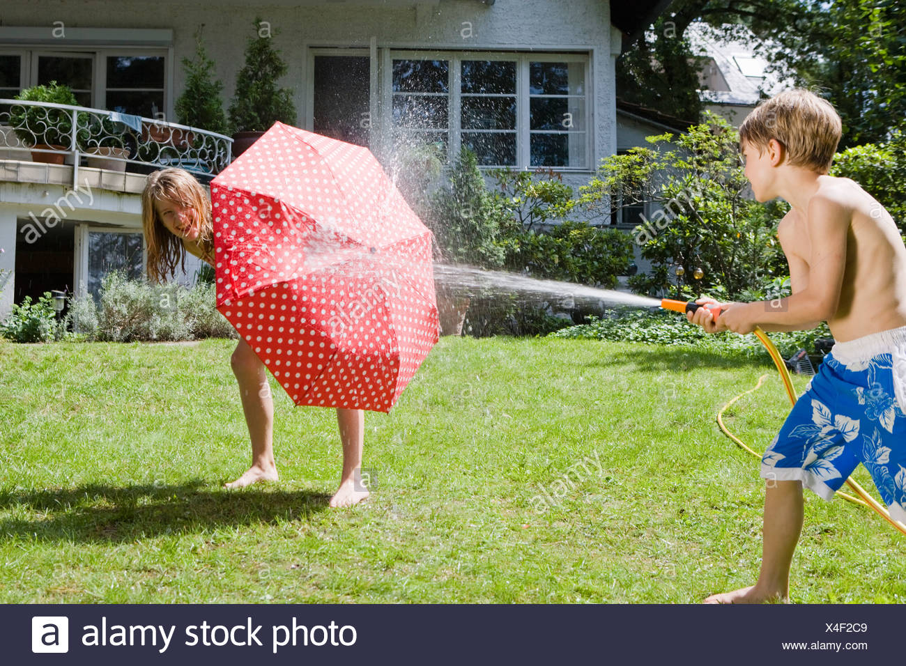 Girls Spraying High Resolution Stock Photography and Images - Alamy