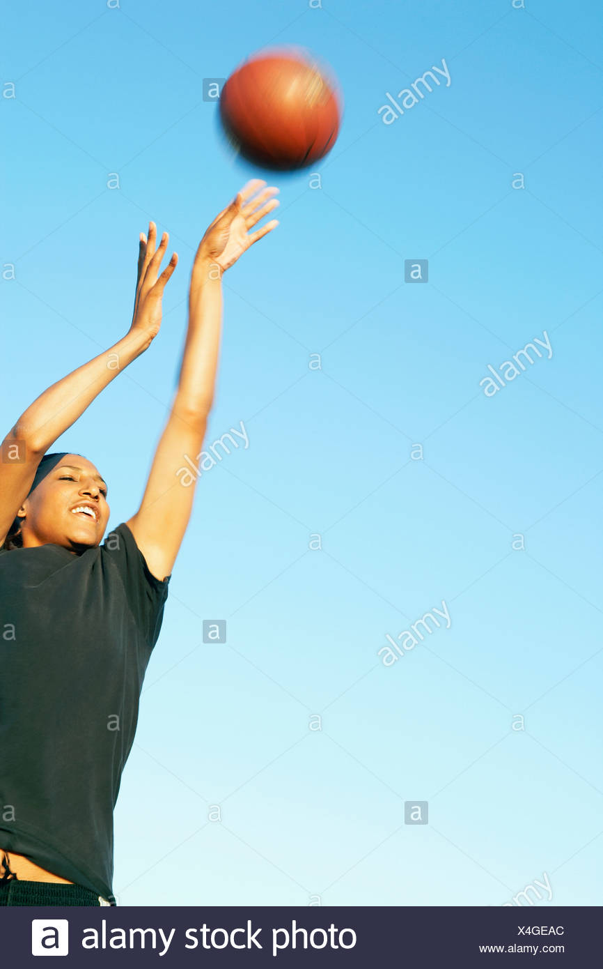 Woman Throwing A Ball High Resolution Stock Photography and Images - Alamy