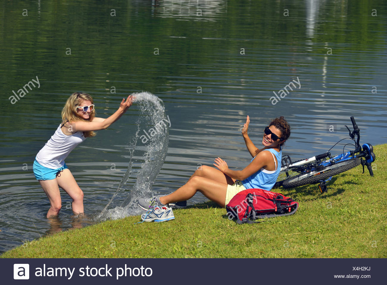 Girl Standing In Shallow Water High Resolution Stock Photography and ...