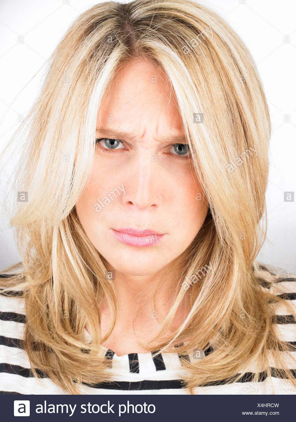 Scowling High Resolution Stock Photography and Images - Alamy