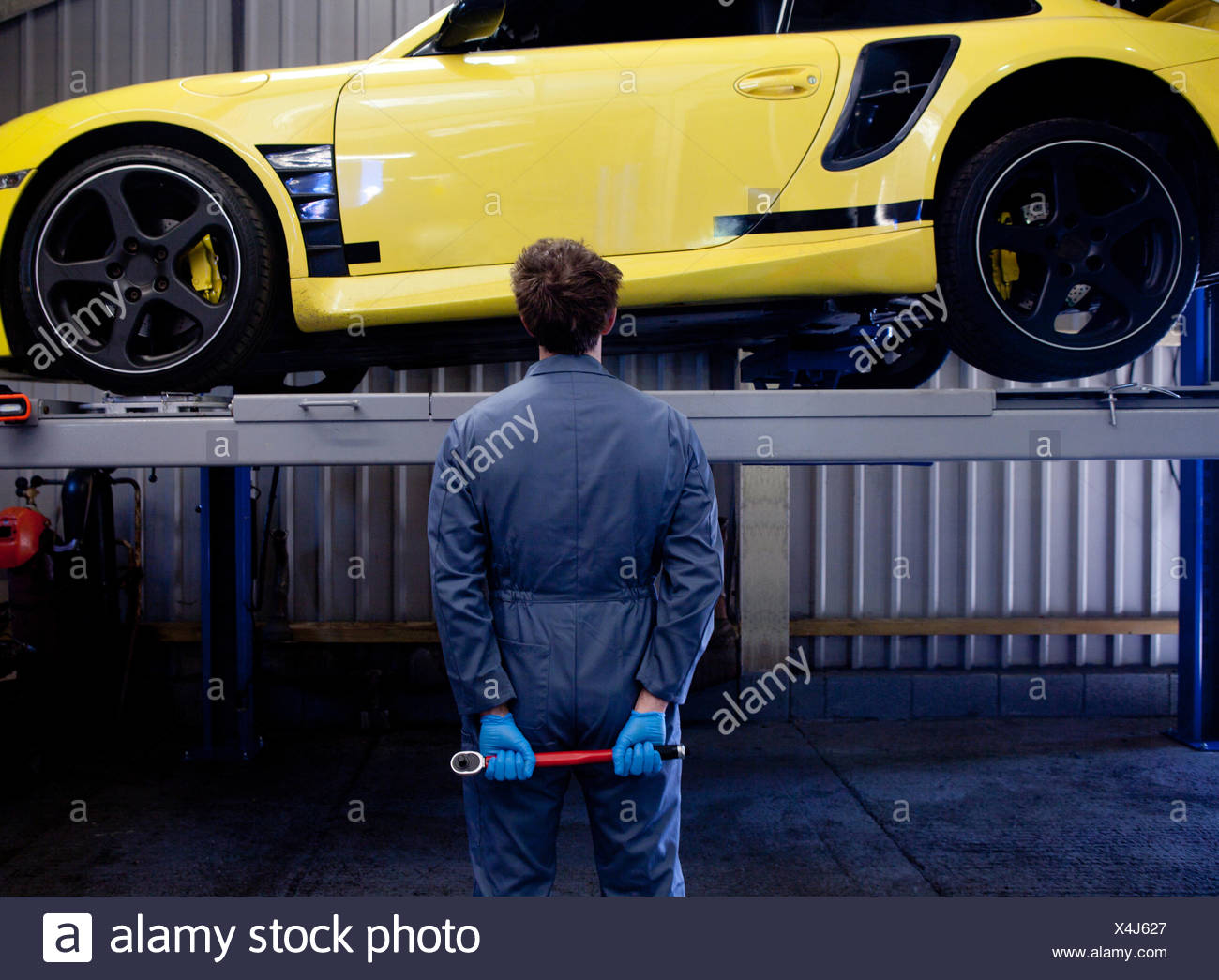 Man Standing Behind Car High Resolution Stock Photography and Images ...
