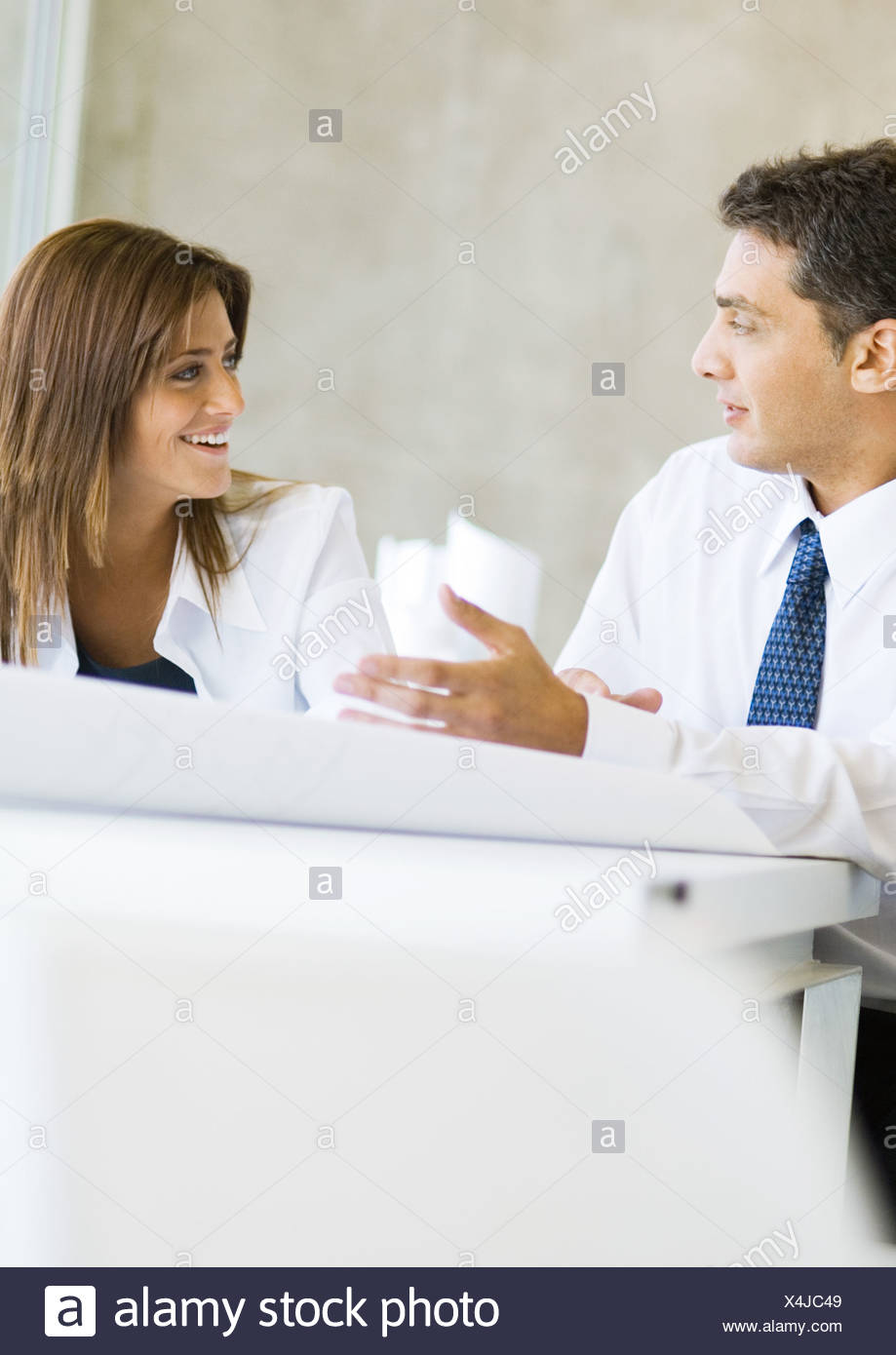 Two Employees Talking High Resolution Stock Photography and Images - Alamy