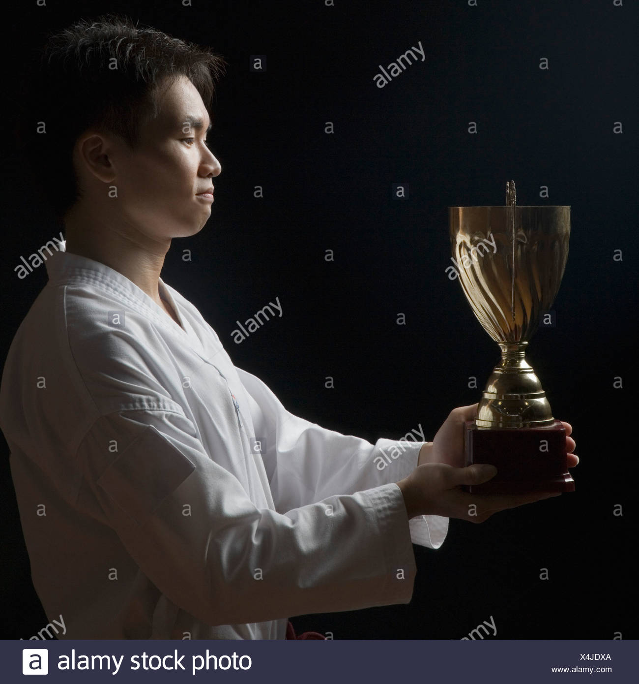 Black Holding Trophy High Resolution Stock Photography and Images - Alamy
