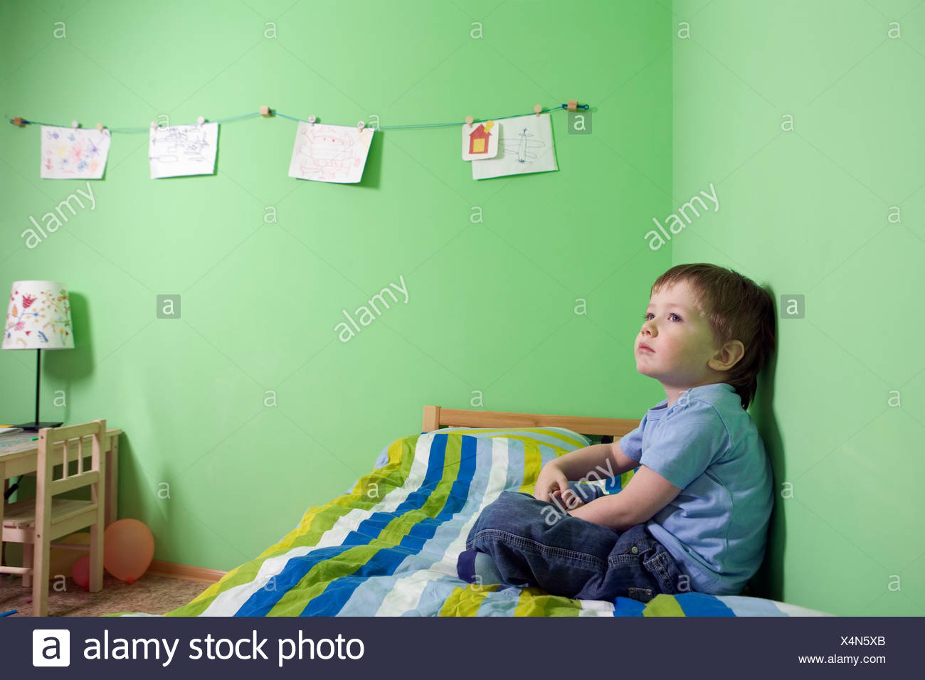 Boy In Room Alone High Resolution Stock Photography and Images - Alamy