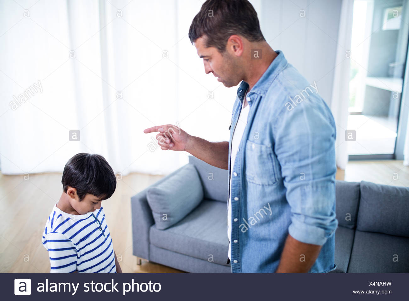 Father Scolding Son Stock Photos & Father Scolding Son Stock Images - Alamy