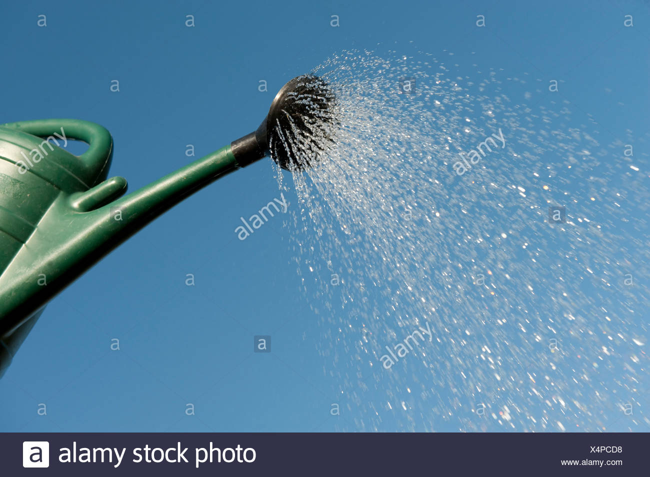 Sprinkling Can High Resolution Stock Photography and Images - Alamy